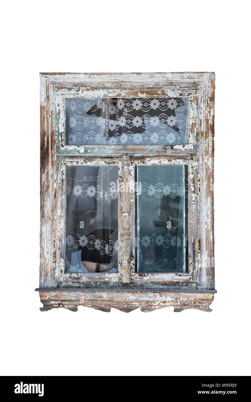 Old window with broken glass isolated on white background, old tulle in ...