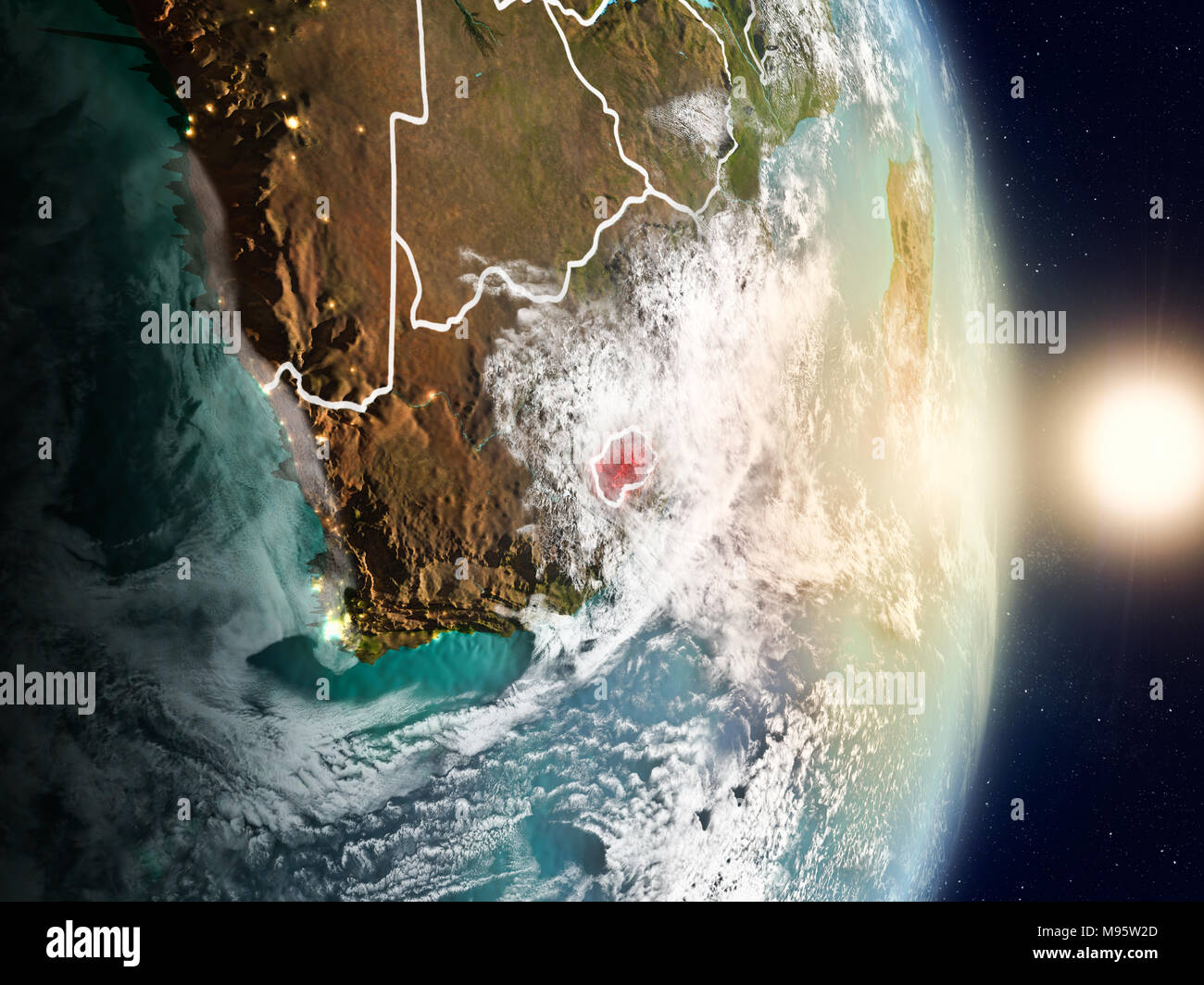 Lesotho during sunrise highlighted in red on planet Earth with visible ...