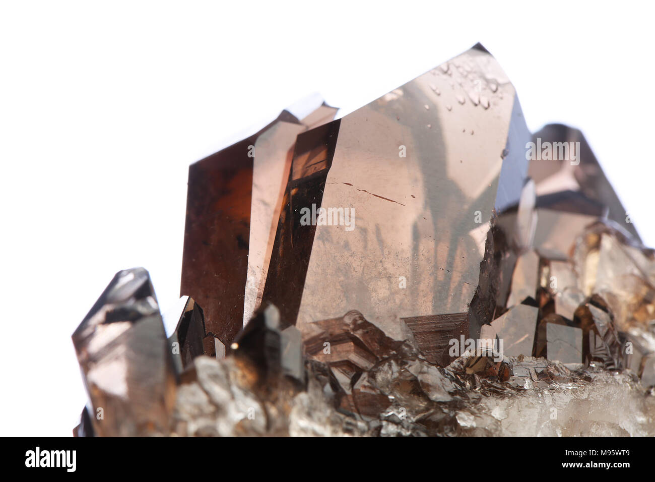 Smoky quartz on a white background geology rock Stock Photo - Alamy