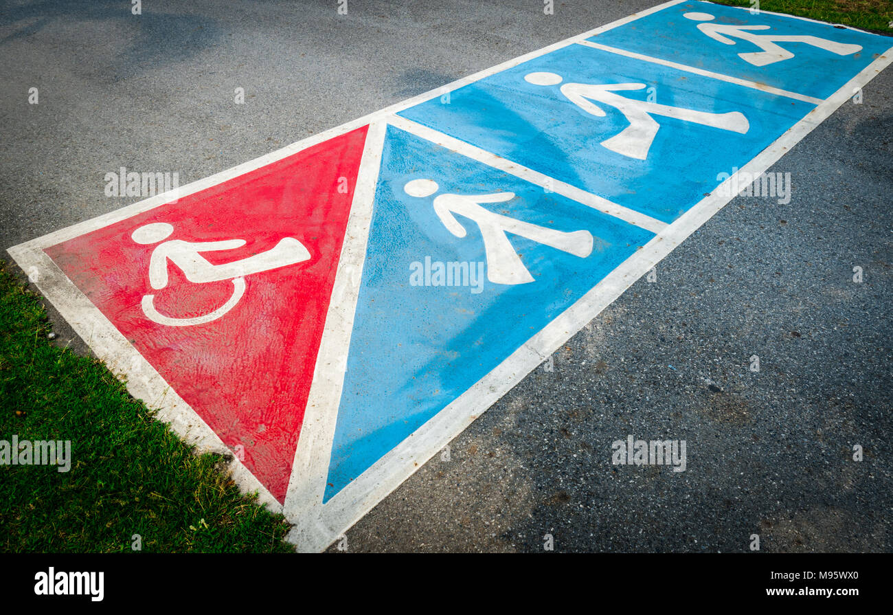 Traffic sign paint on asphalt road for wheelchair or pedestrian walk ...