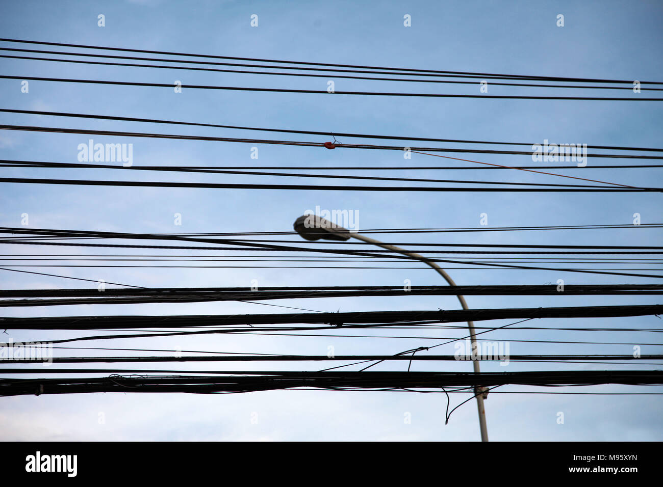 Mixed Eletricity lines in installations in the city of Bangkok in ...