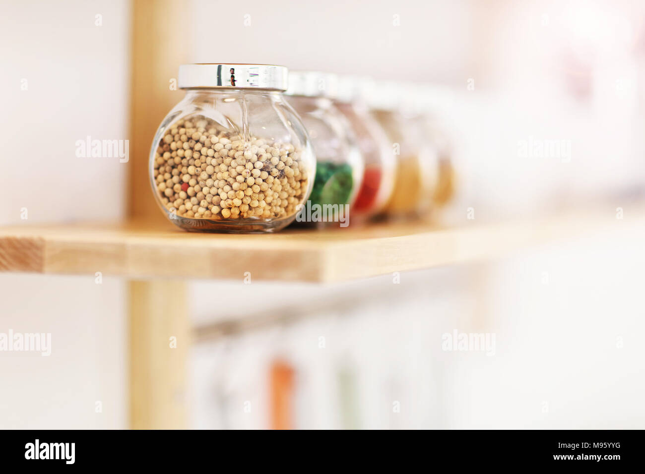 Jars with spices in the kitchen Stock Photo - Alamy
