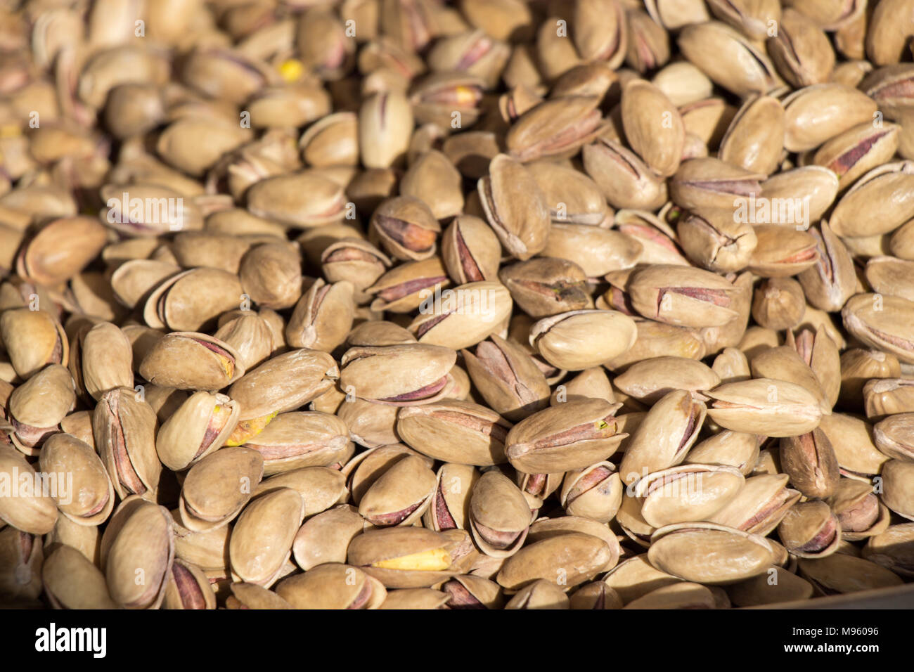 Pistachio nuts with shell ready to eat Stock Photo - Alamy