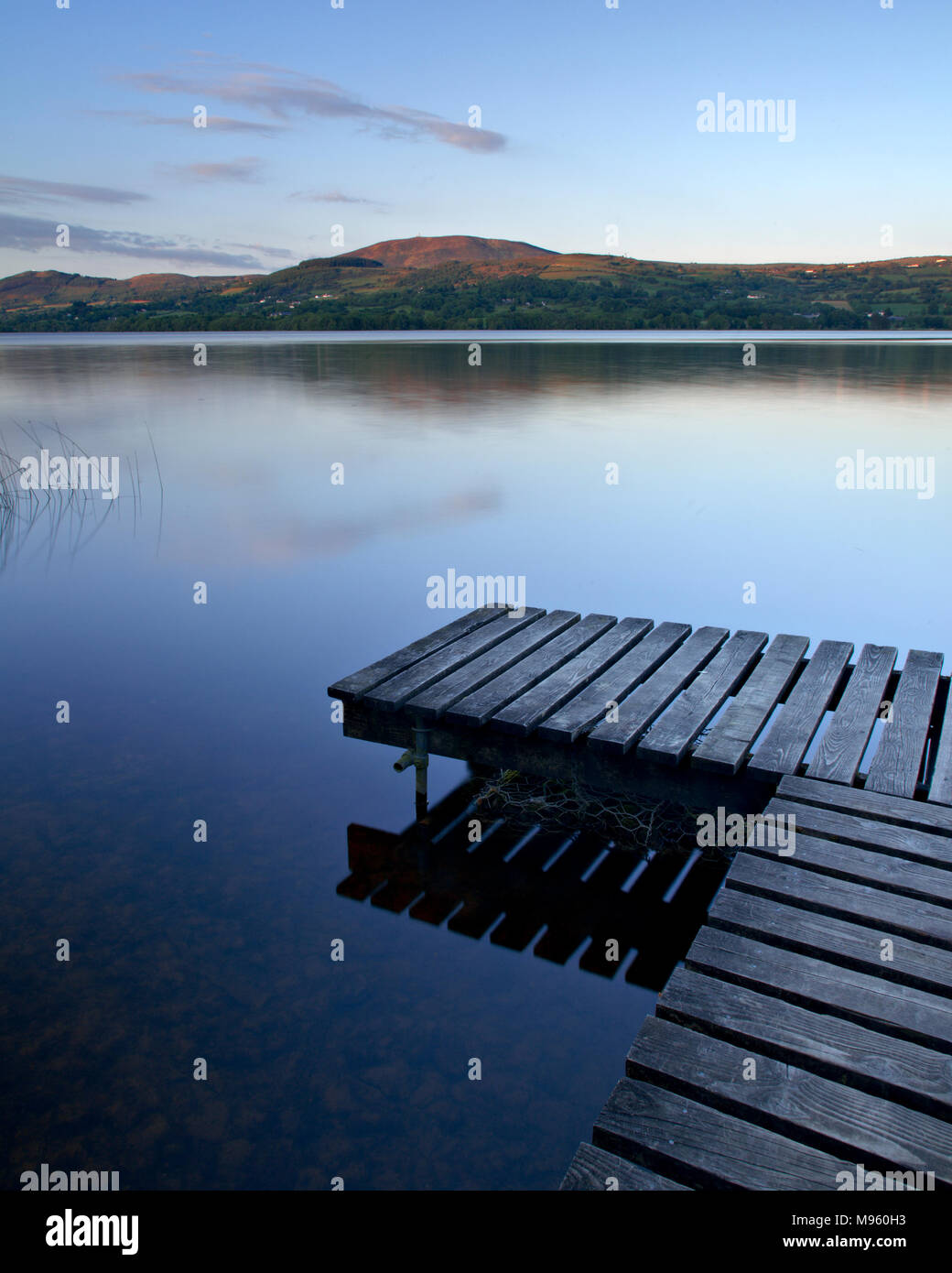 Wooden jetty on the shore of Lough Derg, County Clare, Ireland at ...