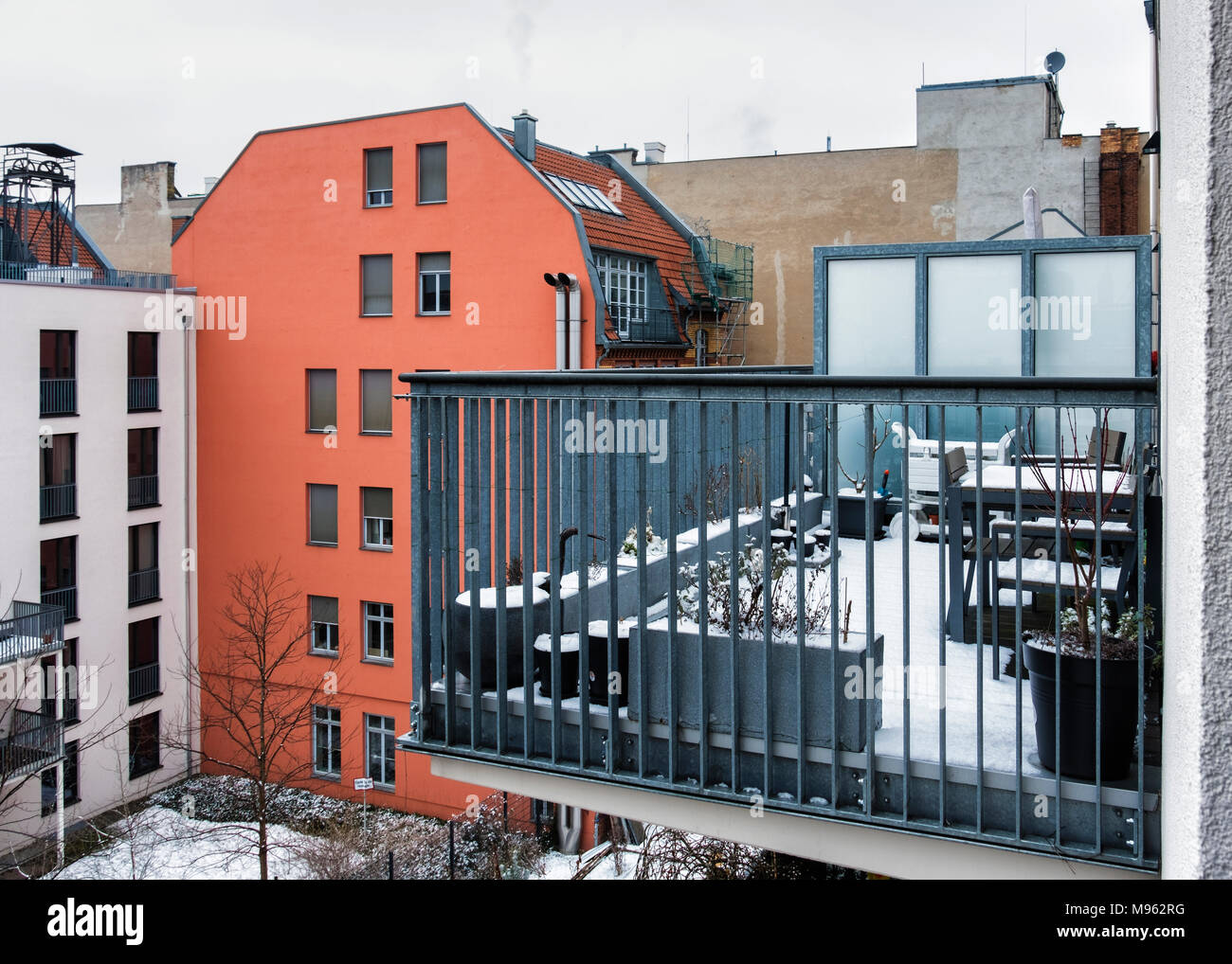 Apartment building balcony with snow covering in Spring - Unseasonal ...