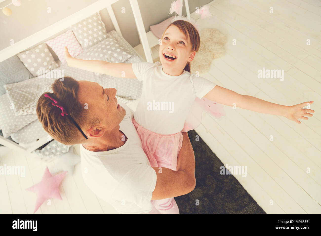 Positive emotional girl feeling happy Stock Photo - Alamy