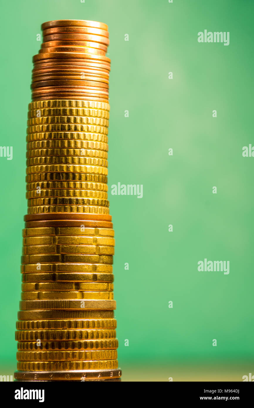 Gold coins stacked green hi-res stock photography and images - Alamy