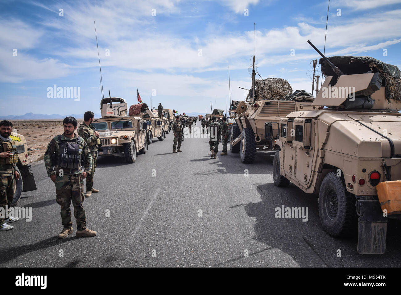 Afghan Commandos during a rest between their convoys consisting of ...