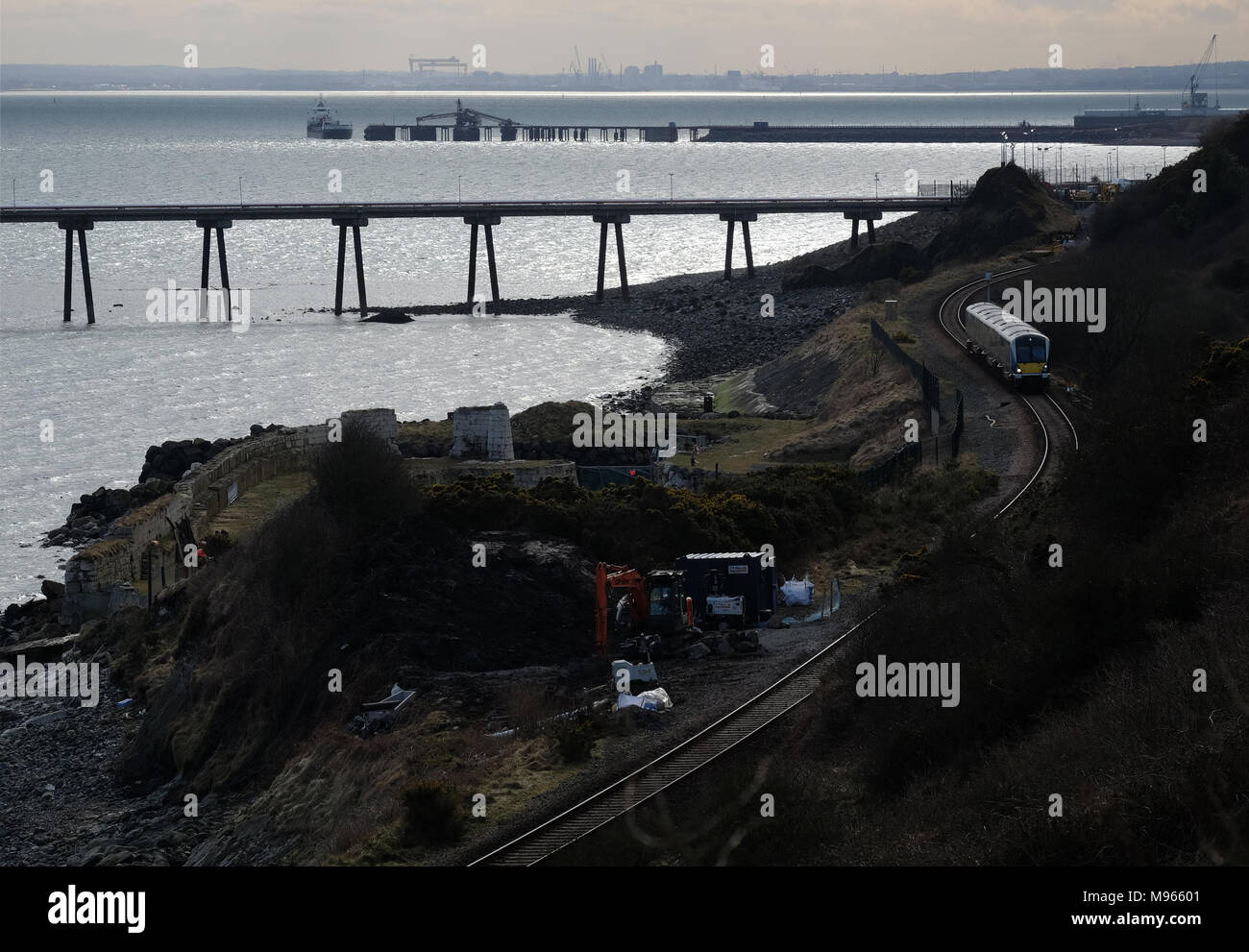 Train passing the White Harbour with Cloghan Point & Irish Salt Mines ...
