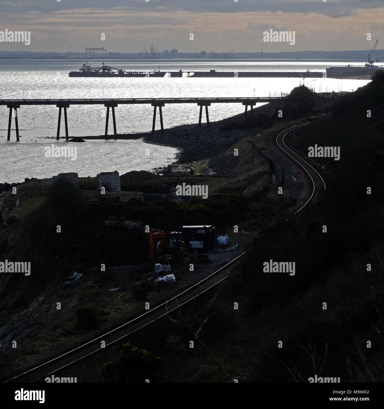 Ship taking on a cargo of salt at Irish Salt Mining jetty, Kilroot ...