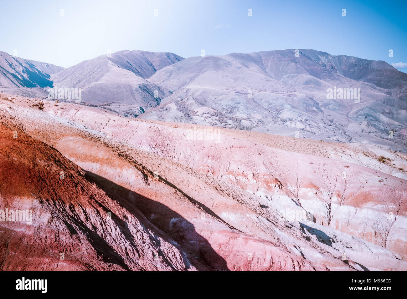 Colorful pink hills under the Sunny sky. Rocks and mountains of pastel ...