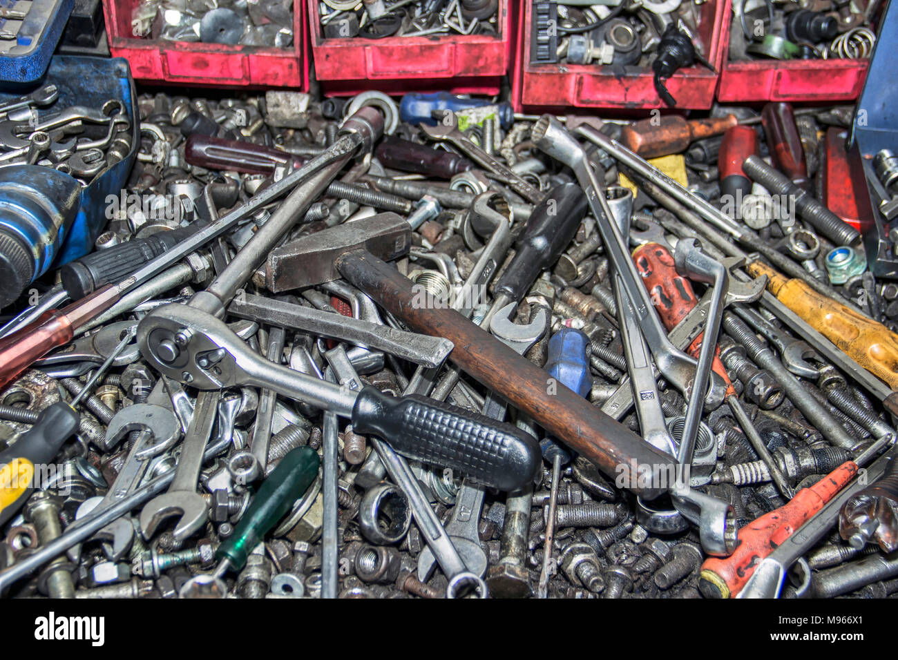 Bunch of messy hand tools in an auto mechanic garage Stock Photo - Alamy
