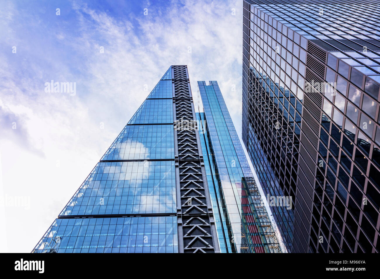 Tapering triangular cheese grater architecture of the reflective facade ...