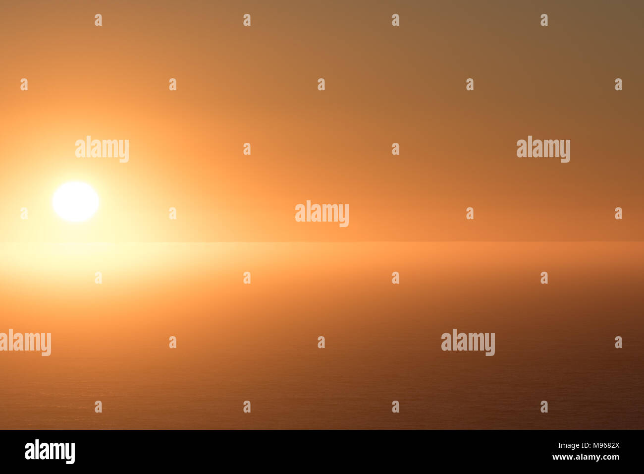 Symmetrical pacific ocean horizon at sunset at Pt. Reyes National ...