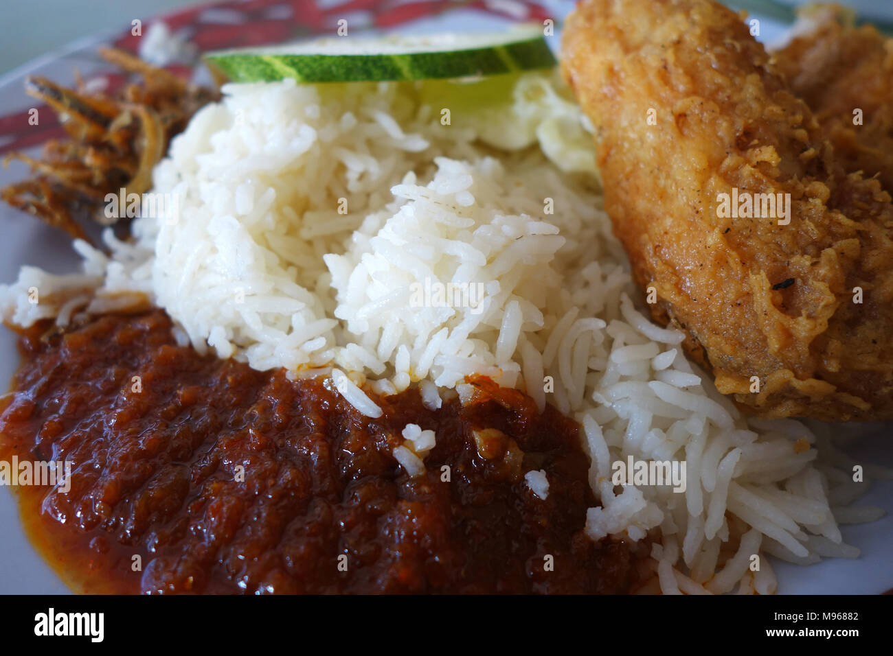 Nasi lemak traditional malaysian spicy rice dish Stock Photo - Alamy