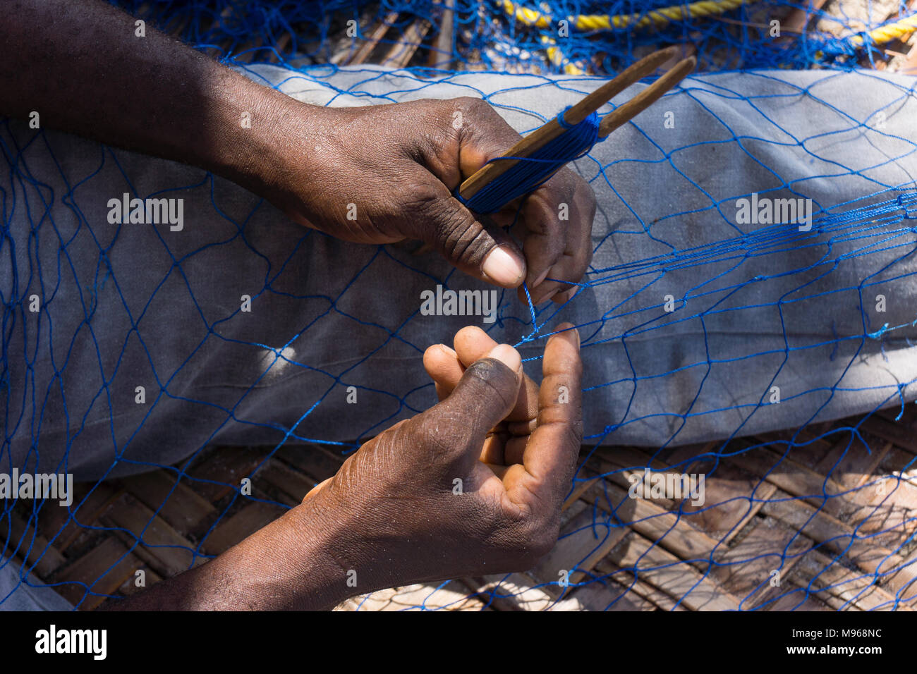 Fisherman Mending Nets Stock Photos & Fisherman Mending Nets Stock ...