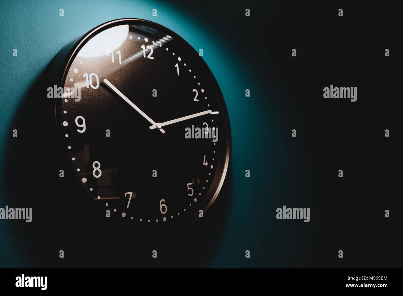 dark wall clock Stock Photo - Alamy
