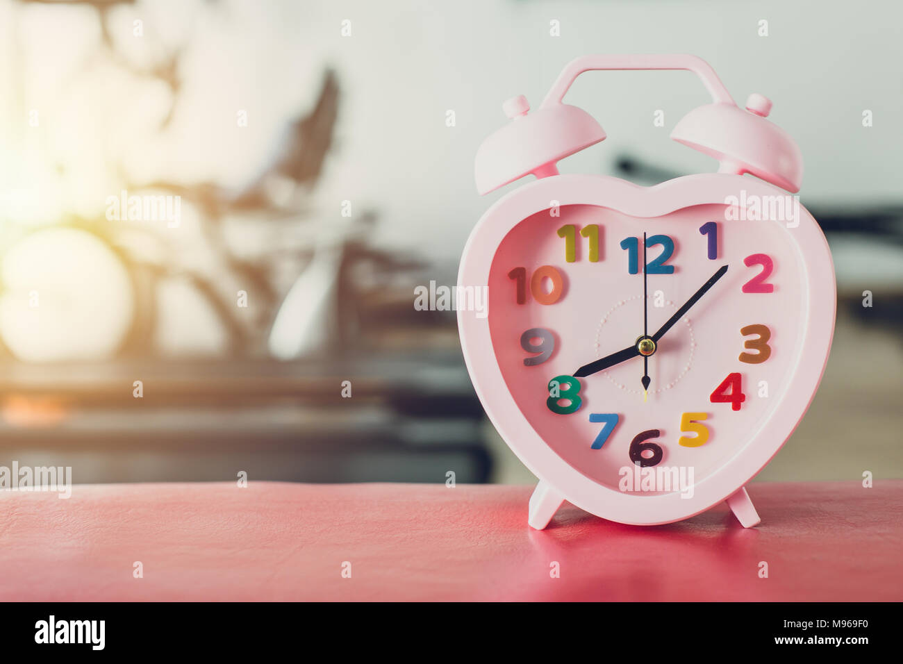 Heart Clock with fitness blur background for times to fit heart concept ...