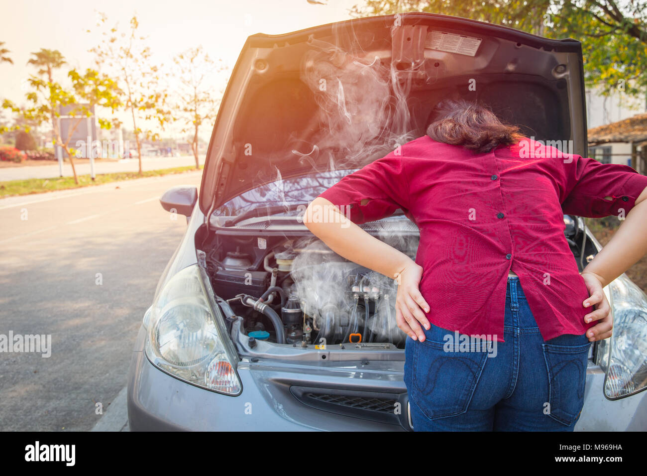 asian women worry and stress a trouble with car engine crash overheat ...