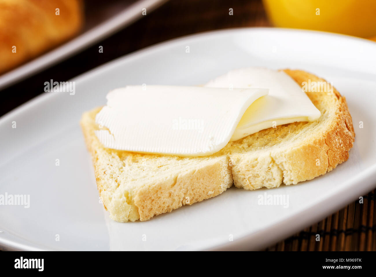 Slice white bread butter hi-res stock photography and images - Alamy