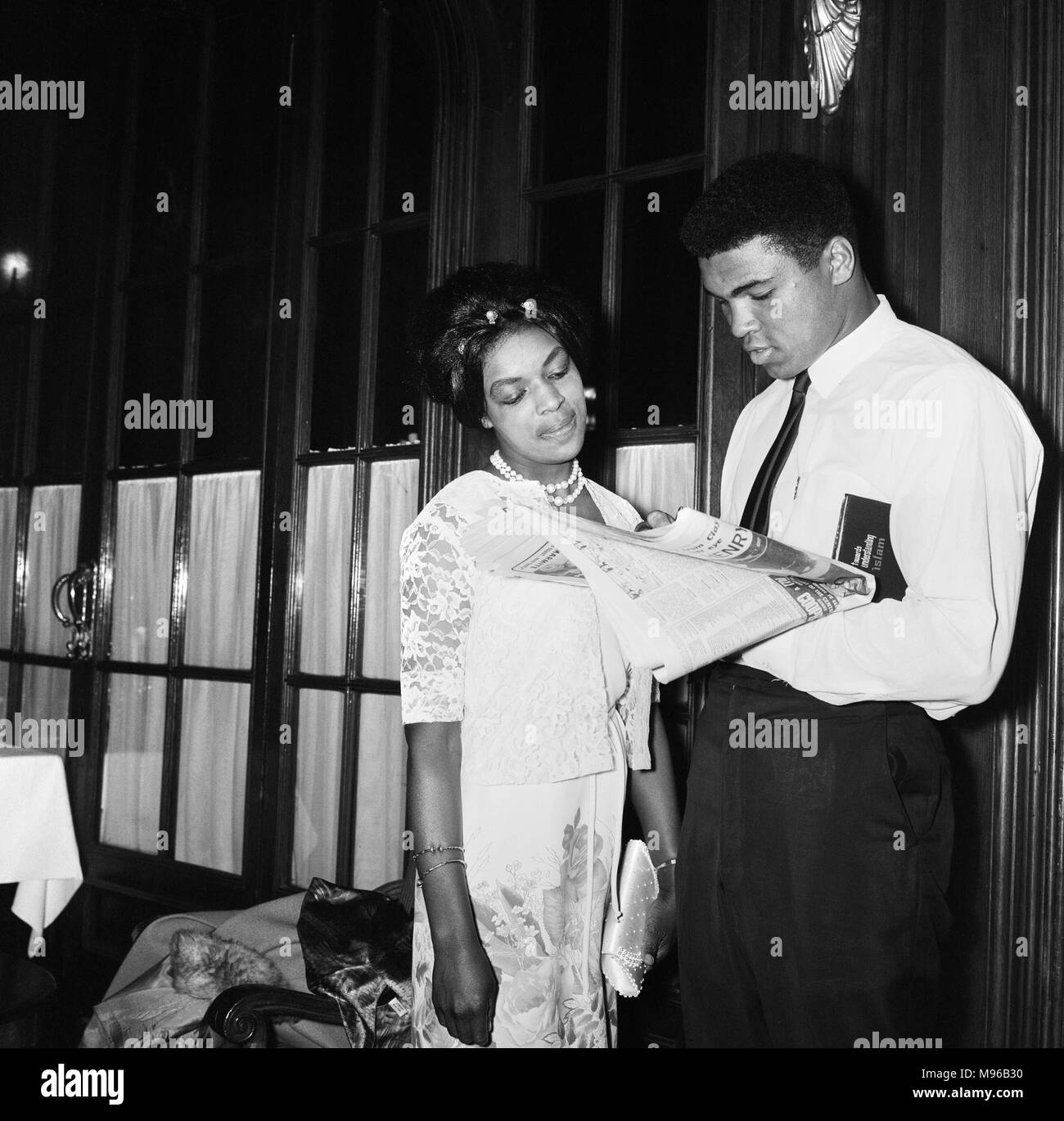 Muhammad Ali (Cassius Clay) with a female fan. Ali is in London for of ...