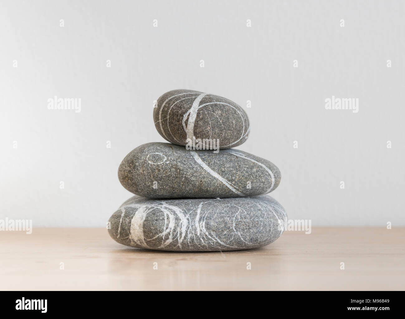 Stacked stripy pebbles Stock Photo - Alamy