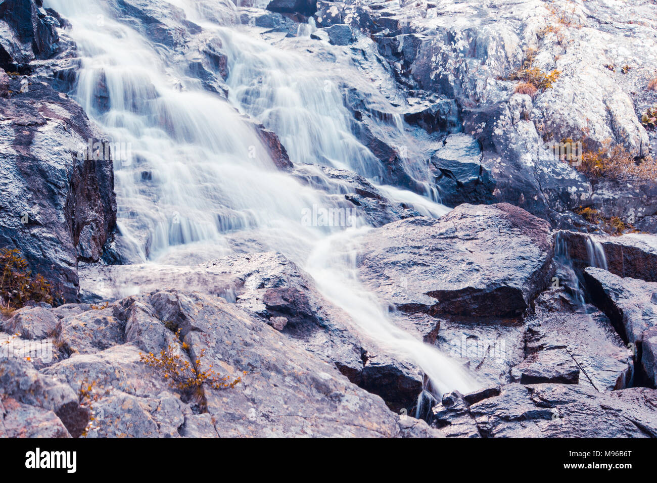 Mountain waterfall on a summer day Stock Photo - Alamy