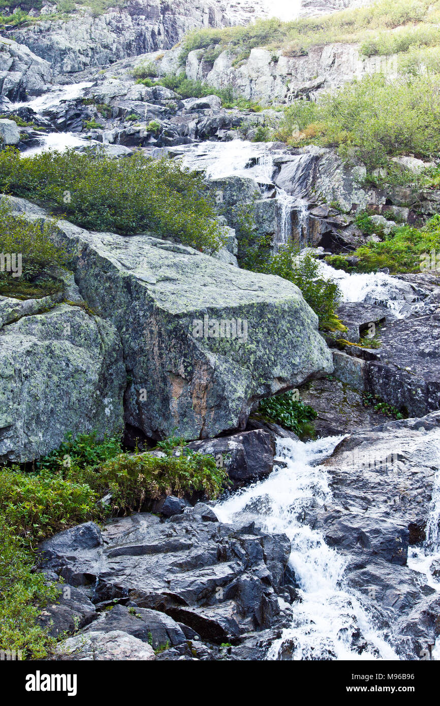 Mountain waterfall on a summer day Stock Photo - Alamy