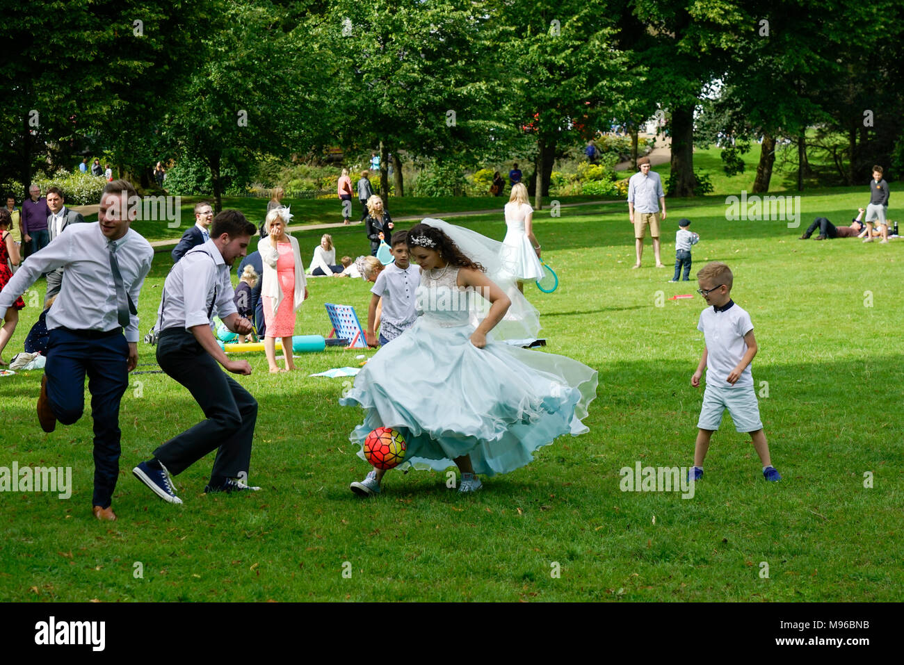 Bride kicking ball hi-res stock photography and images - Alamy