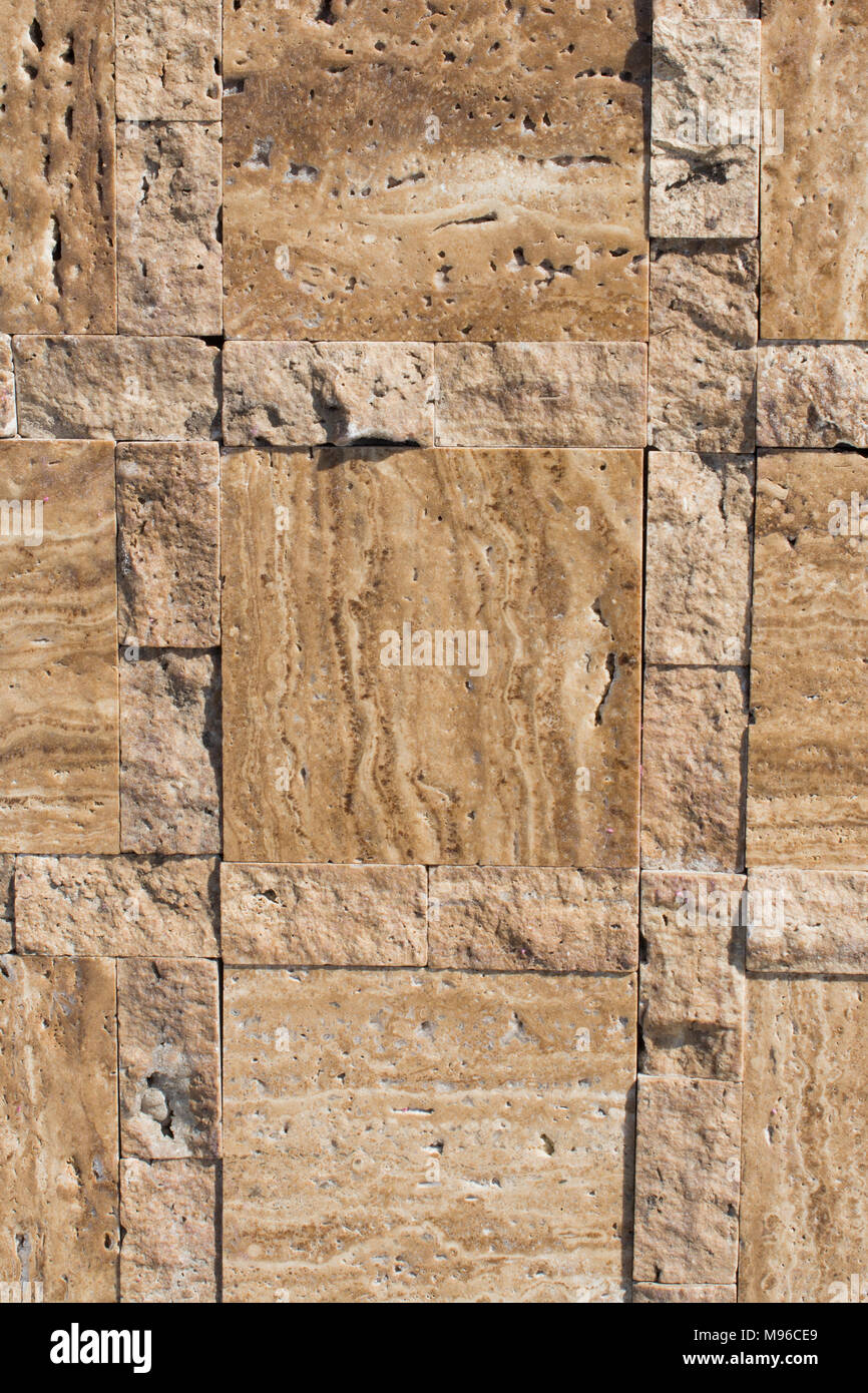 Decorative cubic stone wall as background texture Stock Photo - Alamy