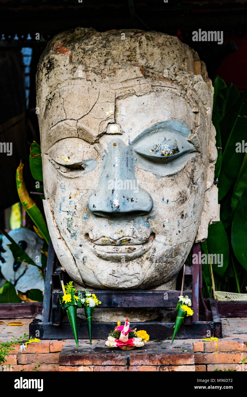 Stone plaster buddha head repaired hi-res stock photography and images ...