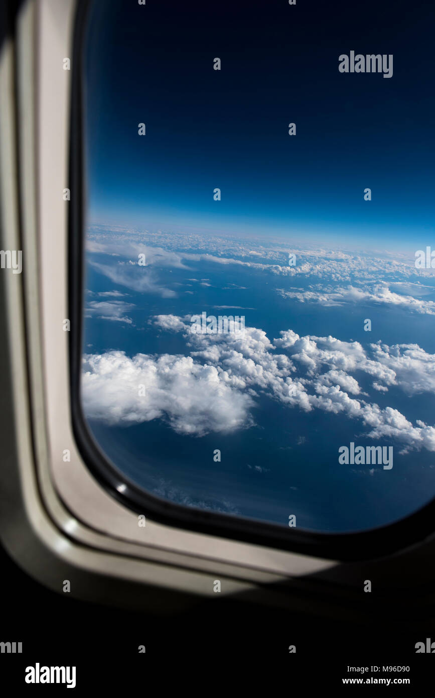 Beautiful clouds view from window of airplane Stock Photo - Alamy