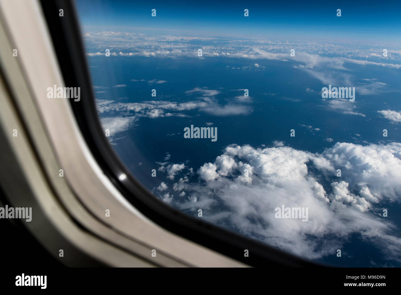 Beautiful clouds view from window of airplane Stock Photo - Alamy