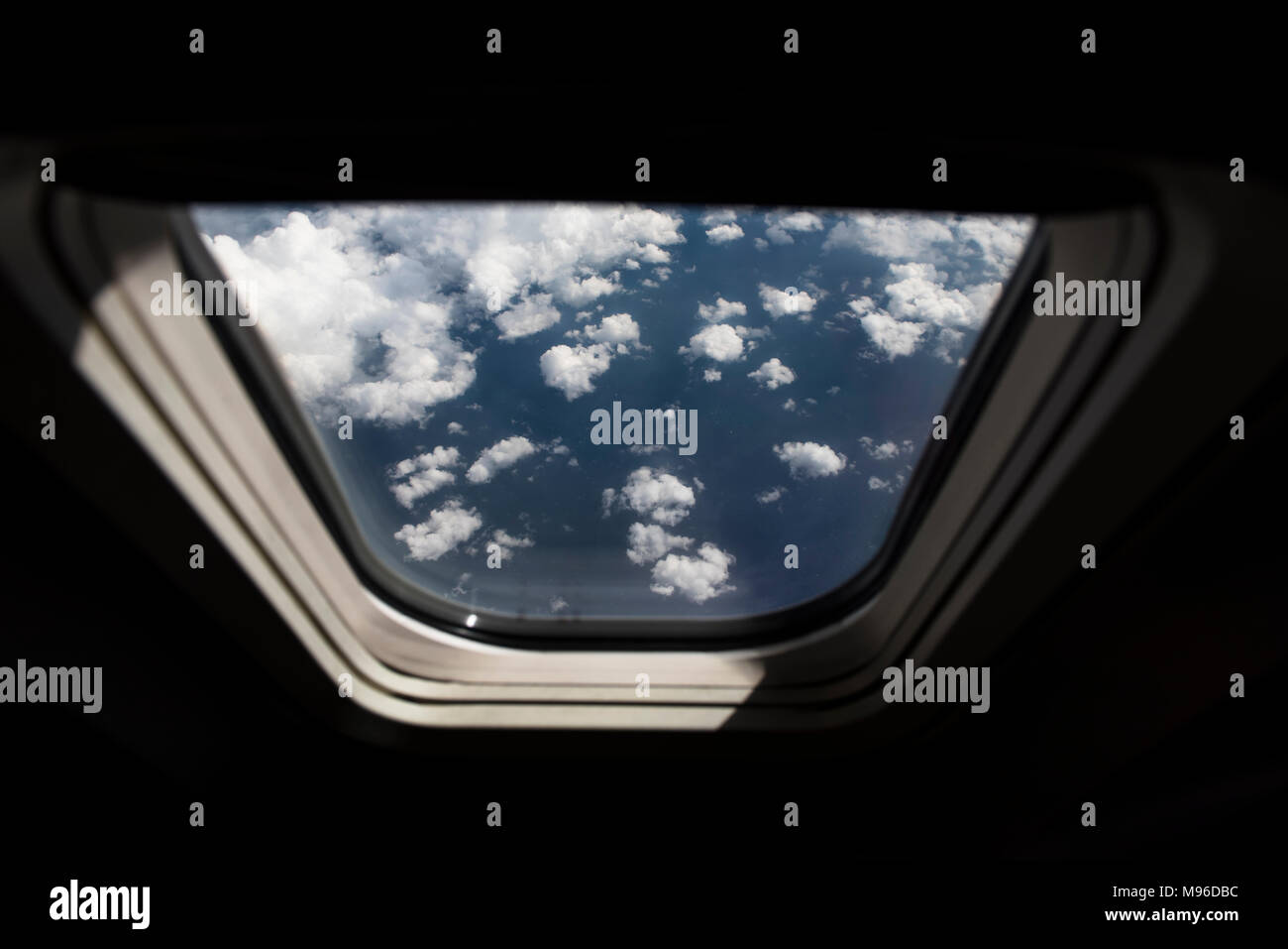 Beautiful clouds view from window of airplane Stock Photo - Alamy