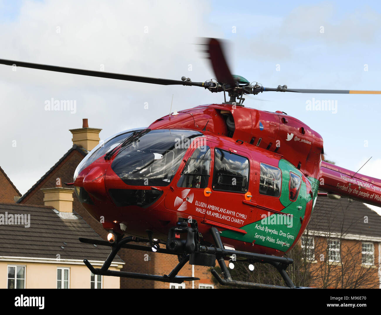 Airbus helicopter of the Wales Air Ambulance service taking off from a ...