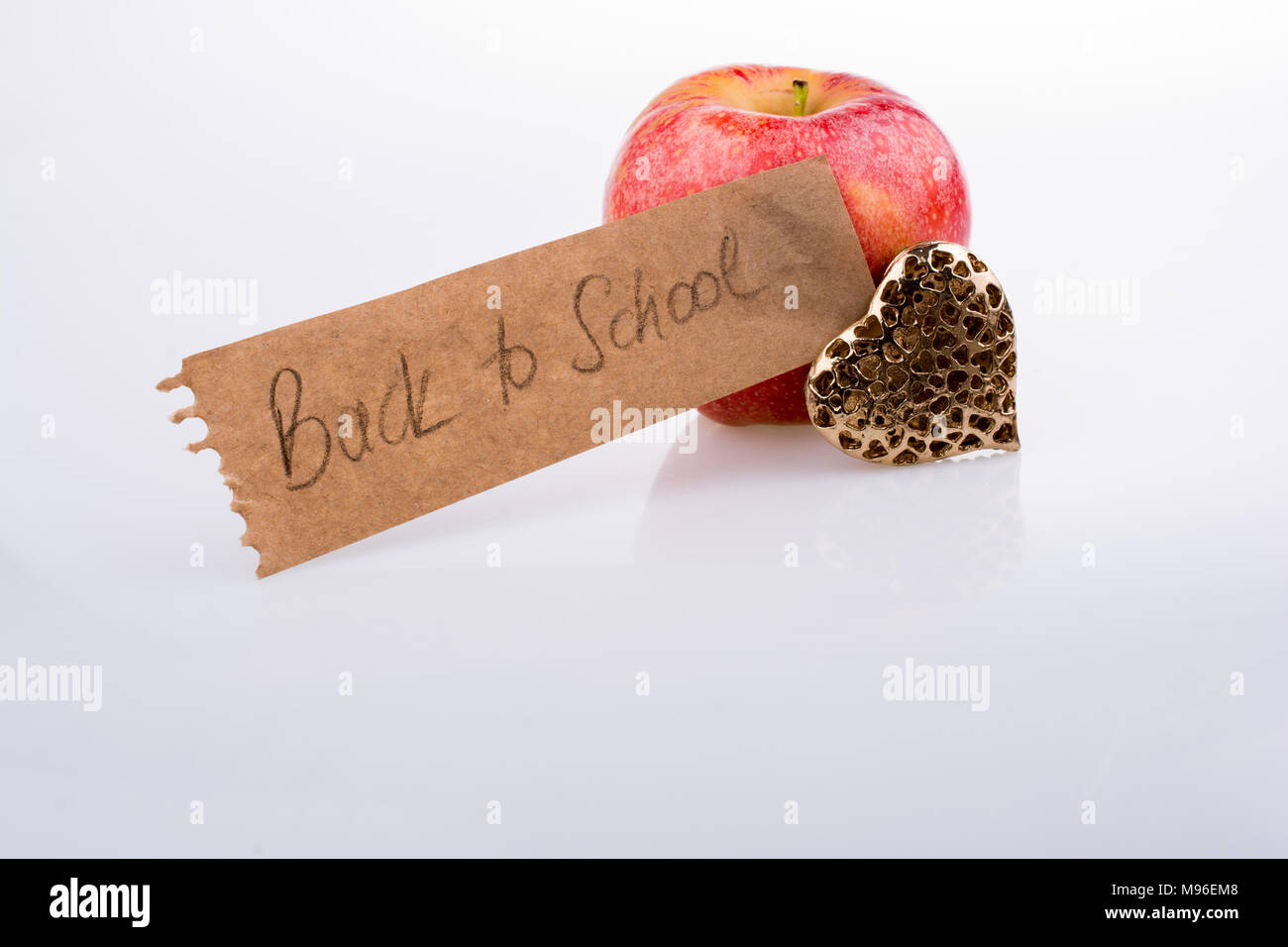 Back to school theme with a heart Stock Photo - Alamy