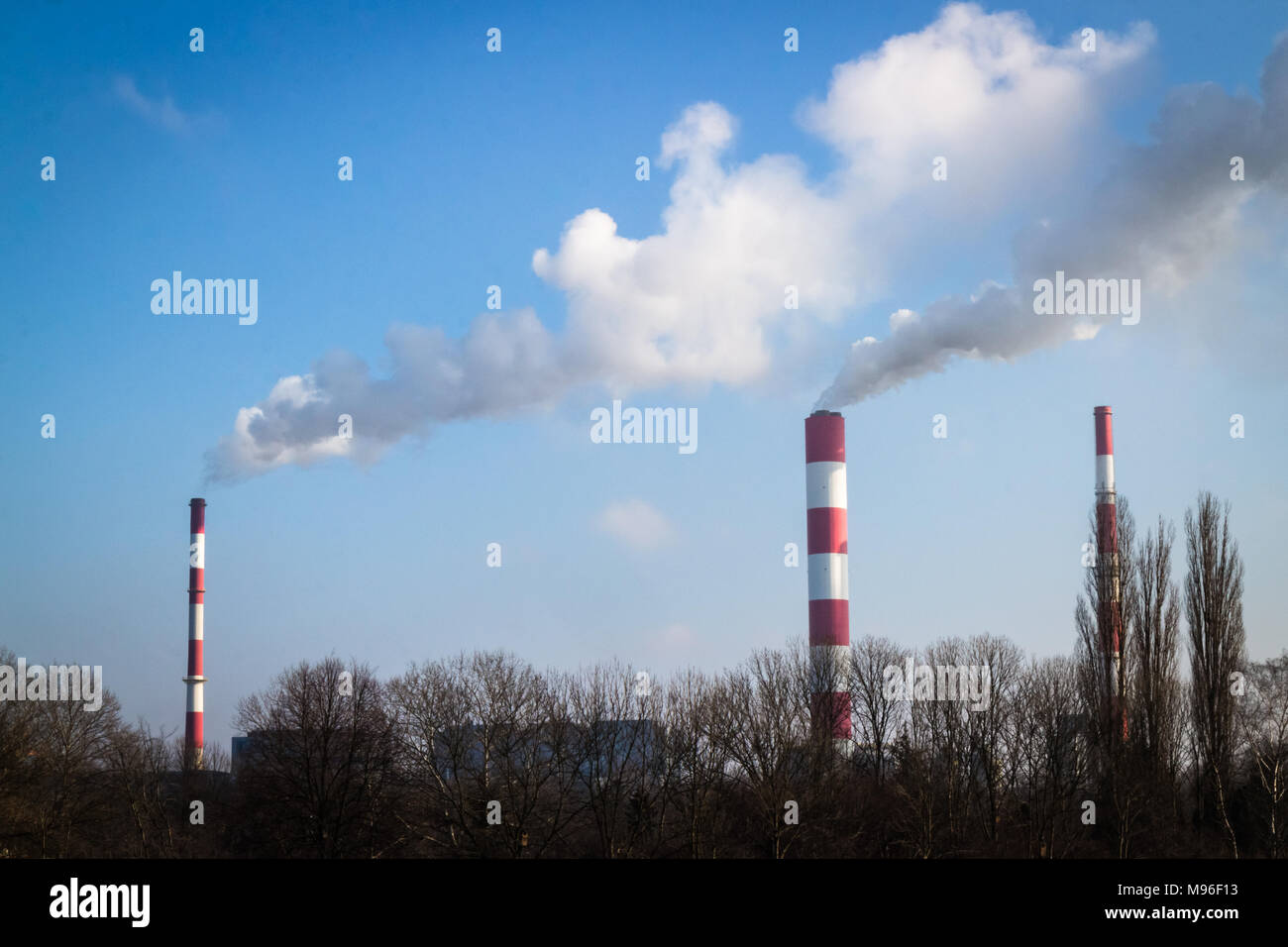 The power station with three smoke stacks air pollution Stock Photo - Alamy