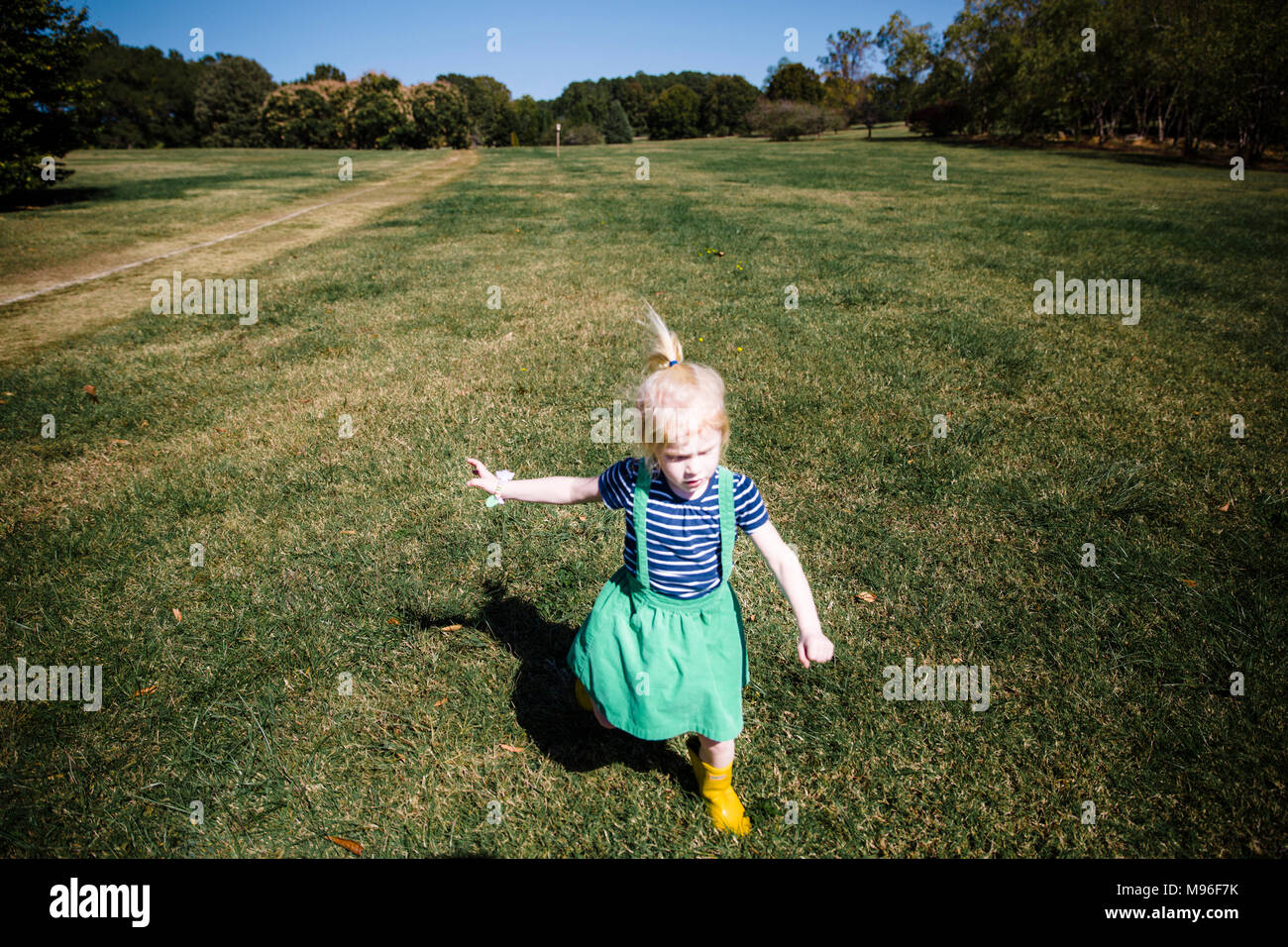 Girl Child Running Through Field High Resolution Stock Photography and ...