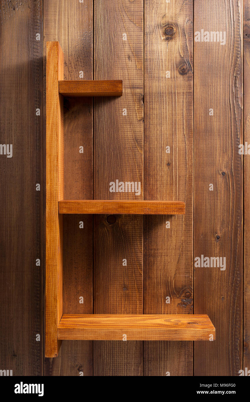 wooden shelf at background texture wall Stock Photo - Alamy