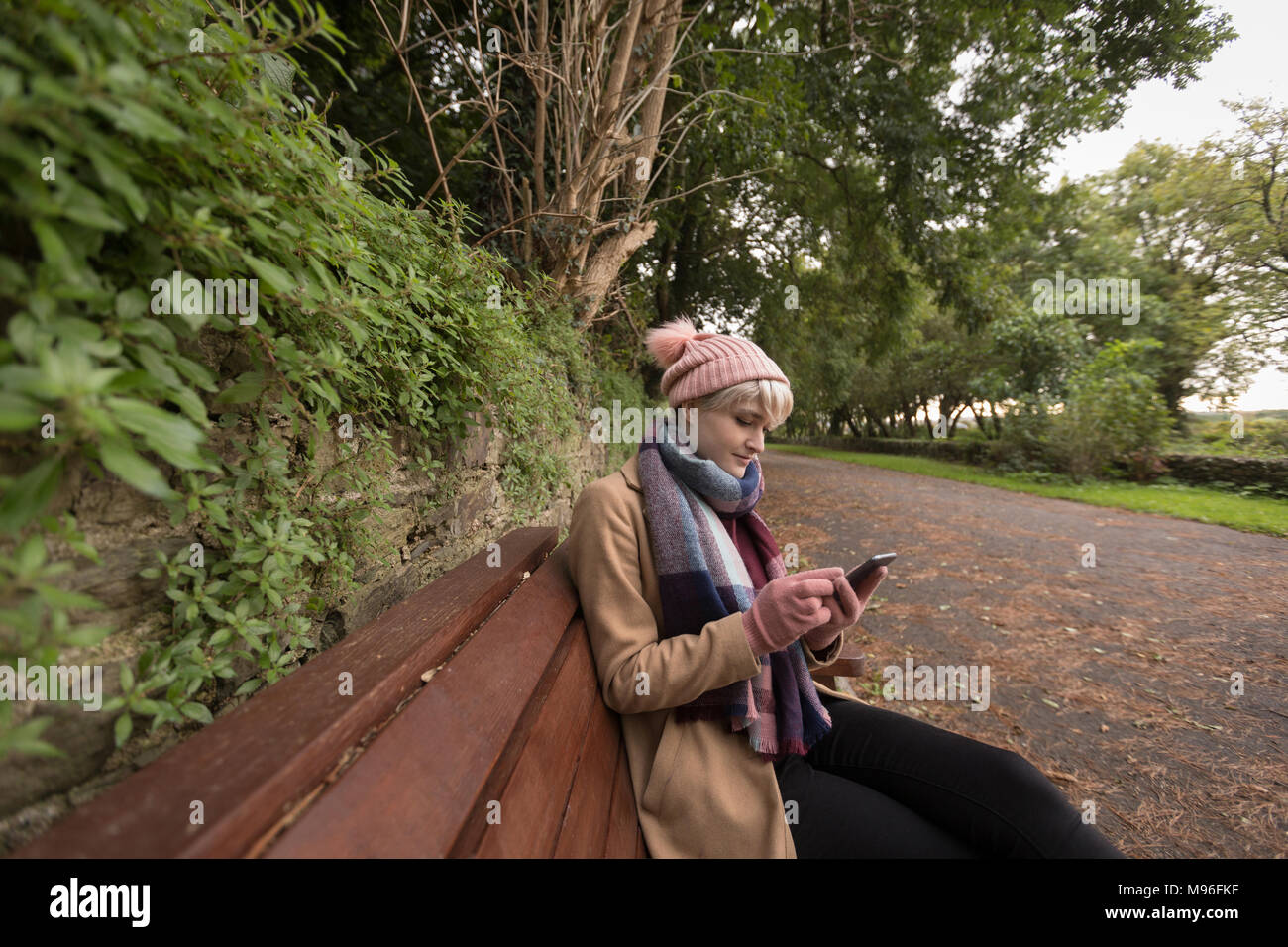 Mobile sitting hi-res stock photography and images - Alamy