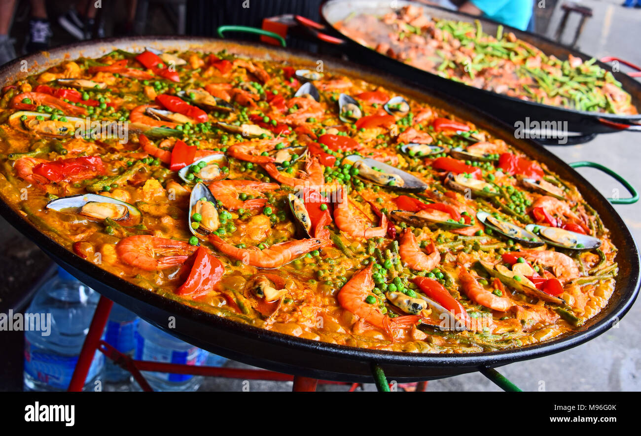 Spanish paella prepared in the street restaurant Stock Photo - Alamy