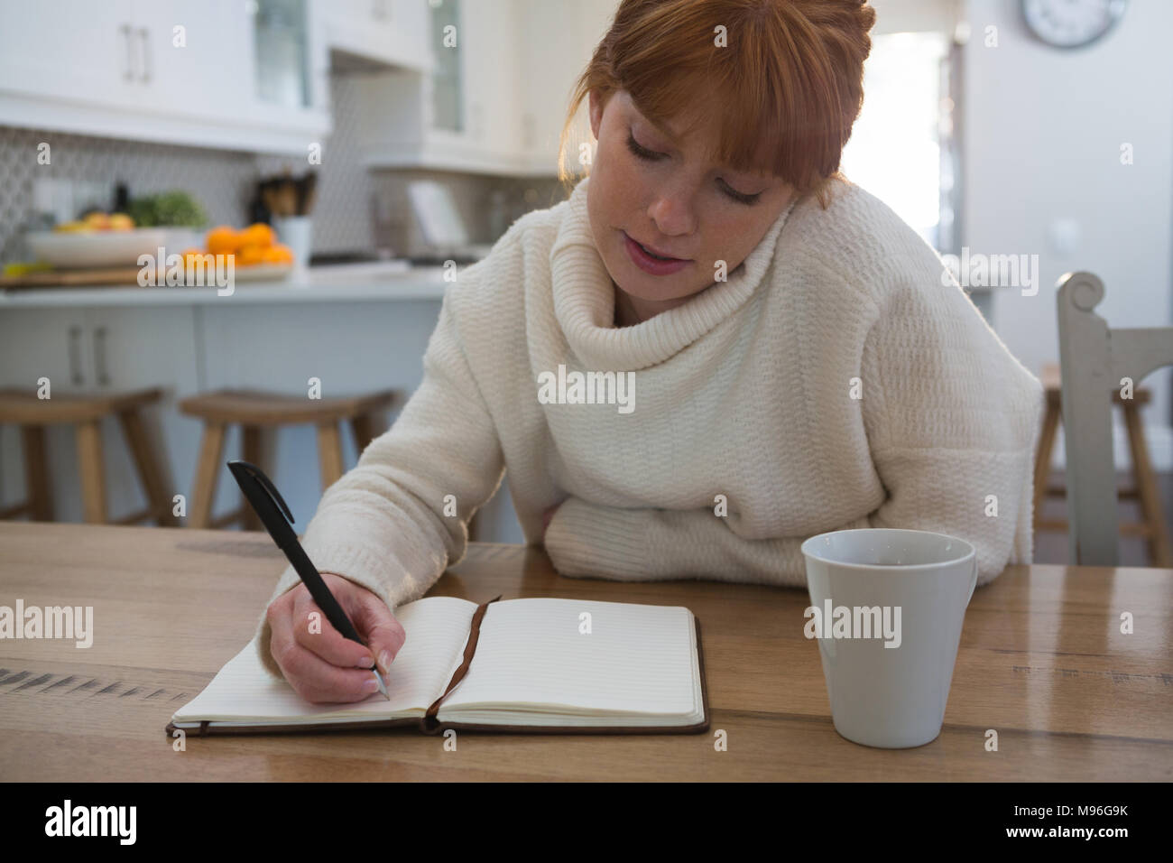 Adult home writing hi-res stock photography and images - Alamy