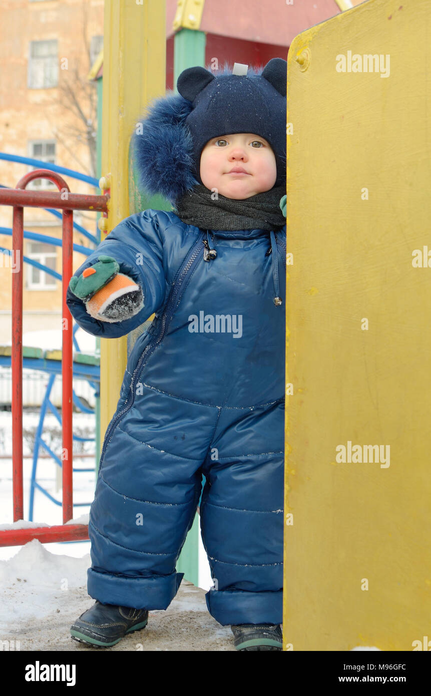 A child plays on the Playground.Very cheerful and playful kid Stock ...