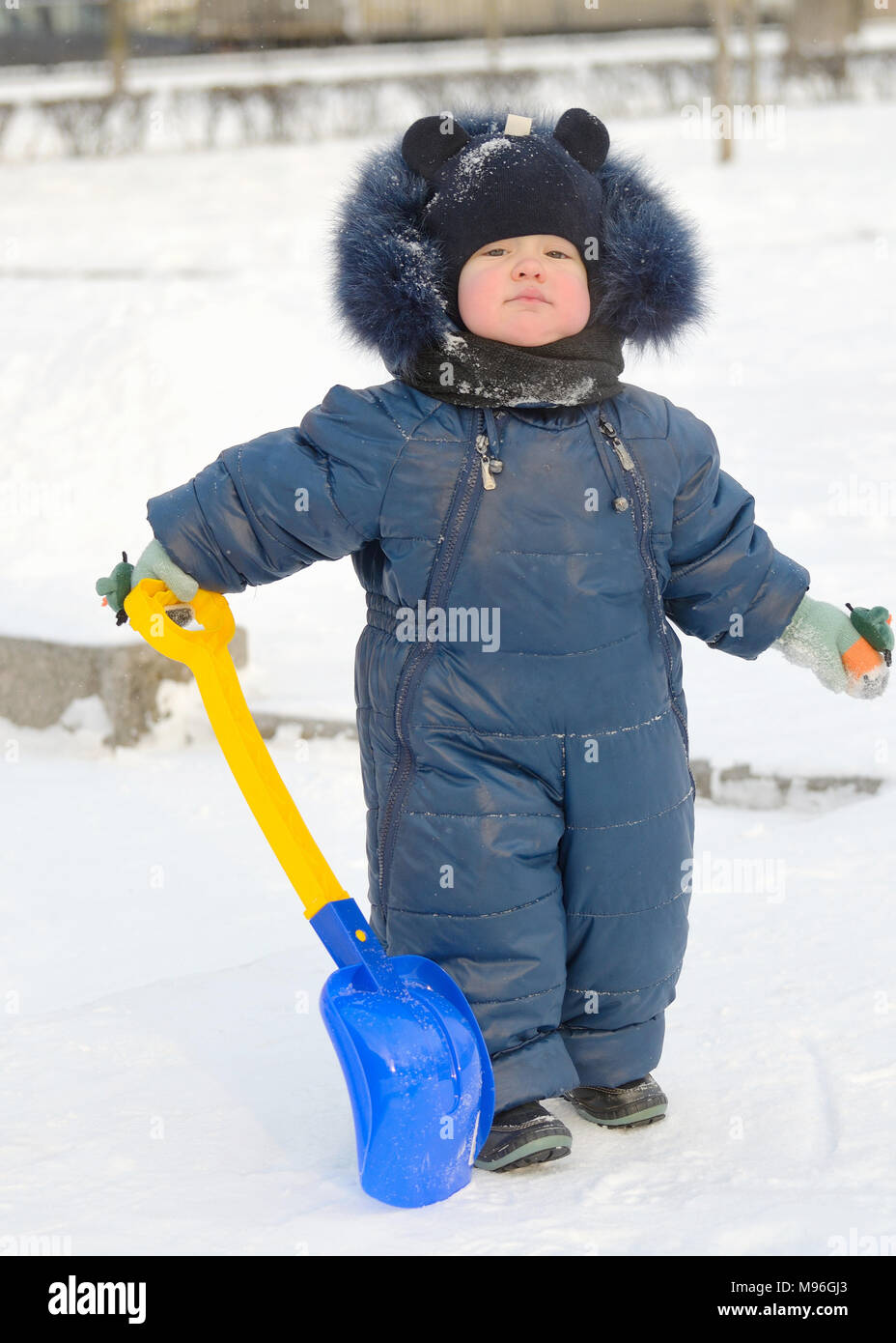 A child plays on the Playground.Very cheerful and playful kid Stock ...