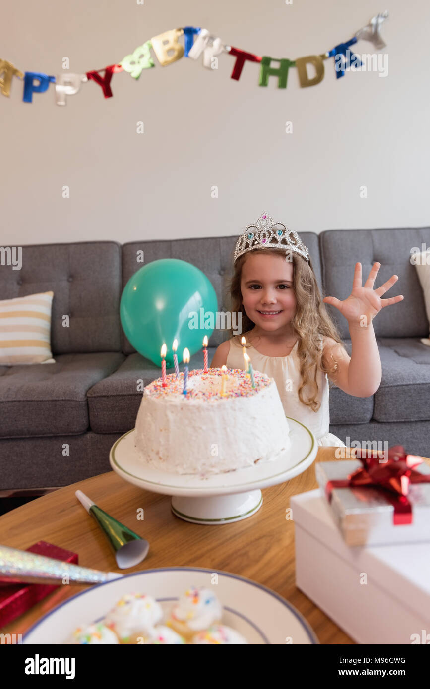 Cute girl celebrating her birthday Stock Photo - Alamy