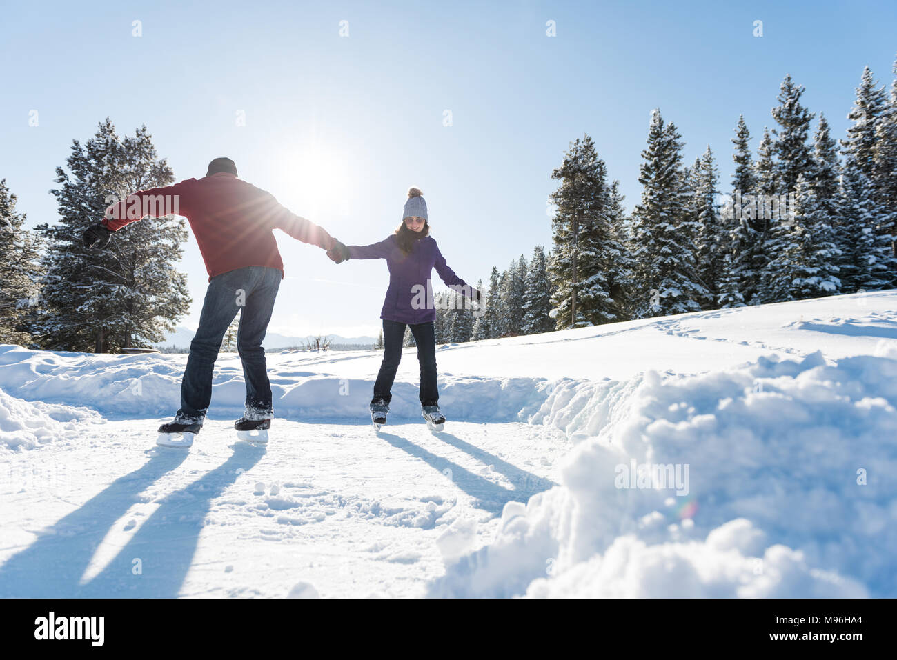 Man and woman skating hi-res stock photography and images - Alamy