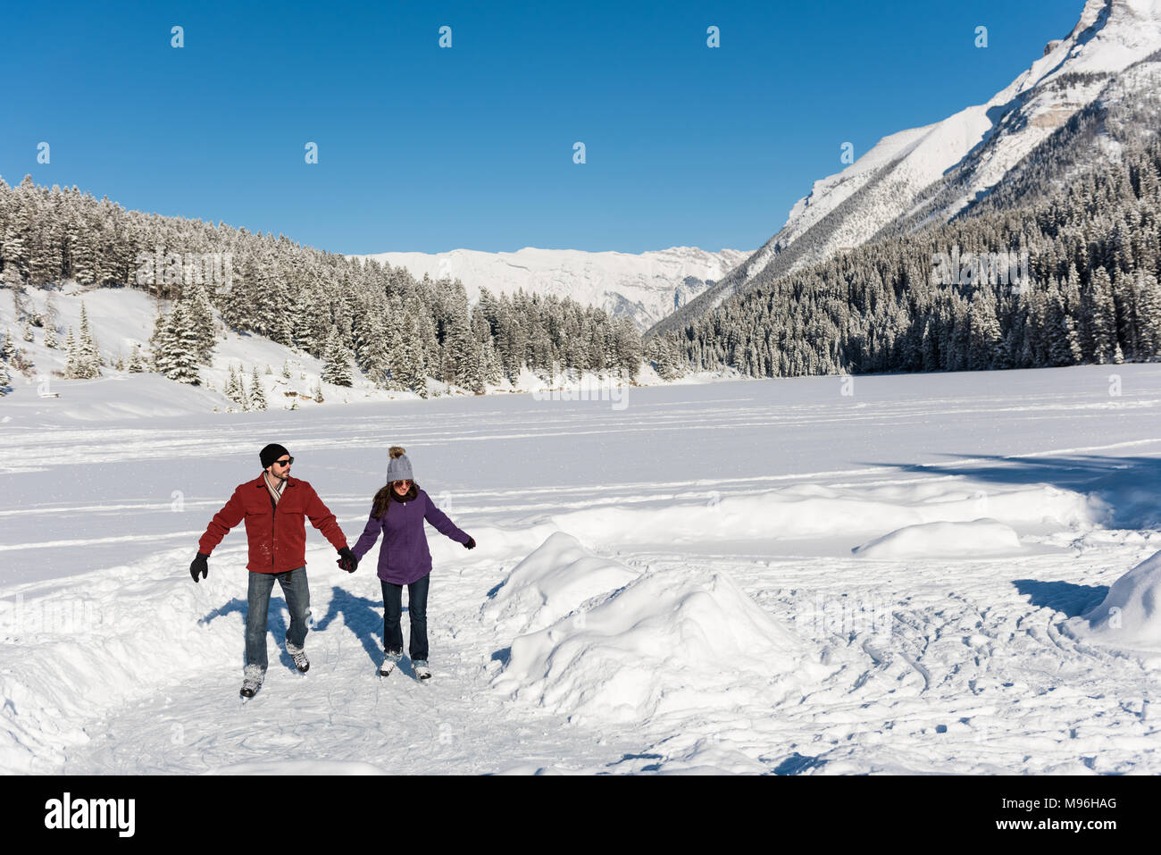 Man and woman skating hi-res stock photography and images - Alamy