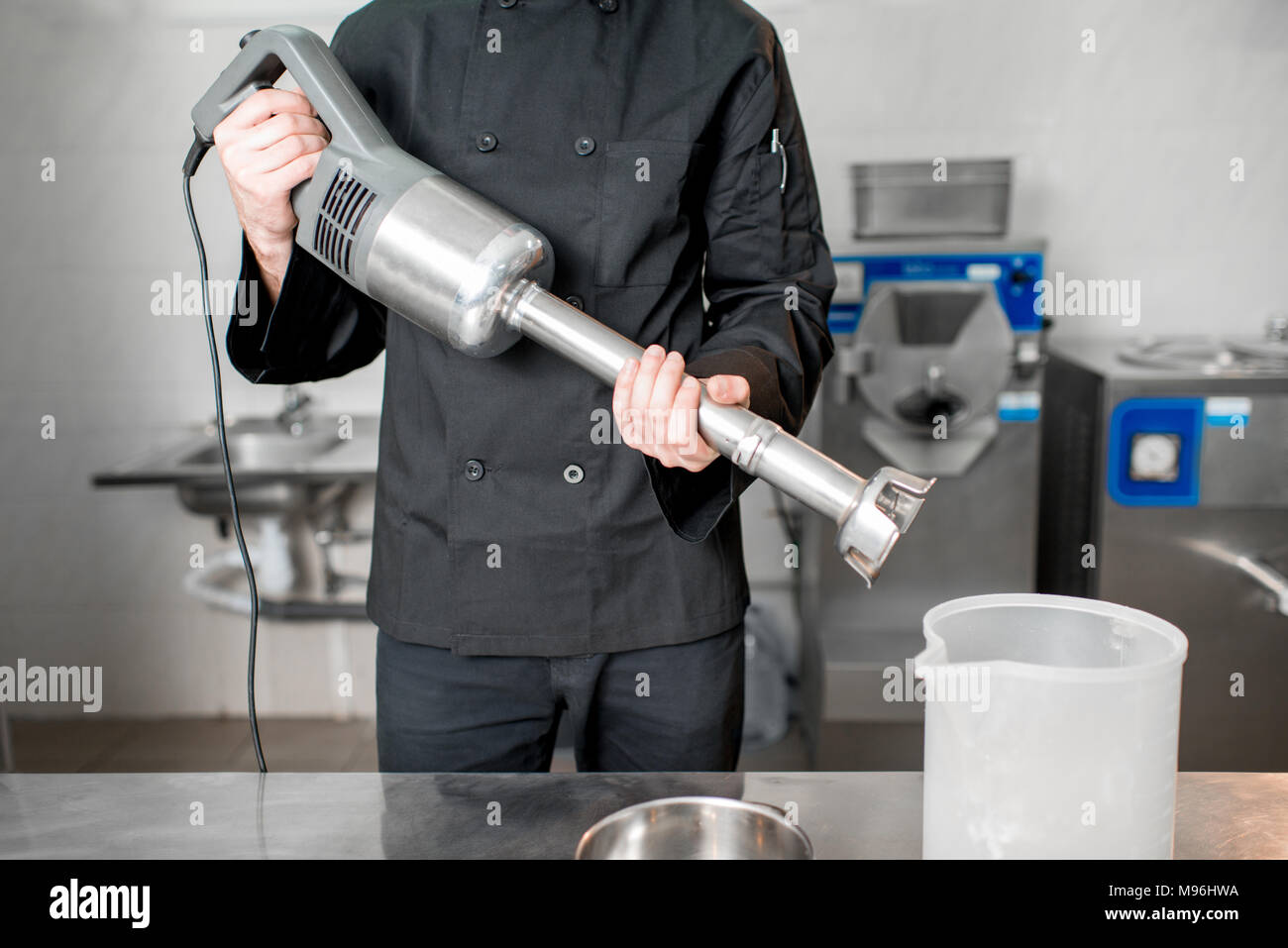 Chef cook taking professional blender for ice cream mixing in the ...