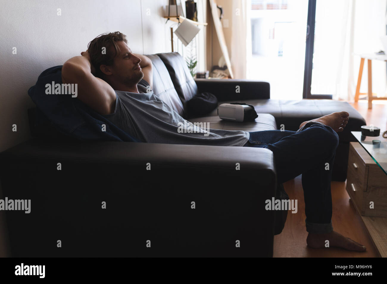 Man resting head on table hi-res stock photography and images - Alamy
