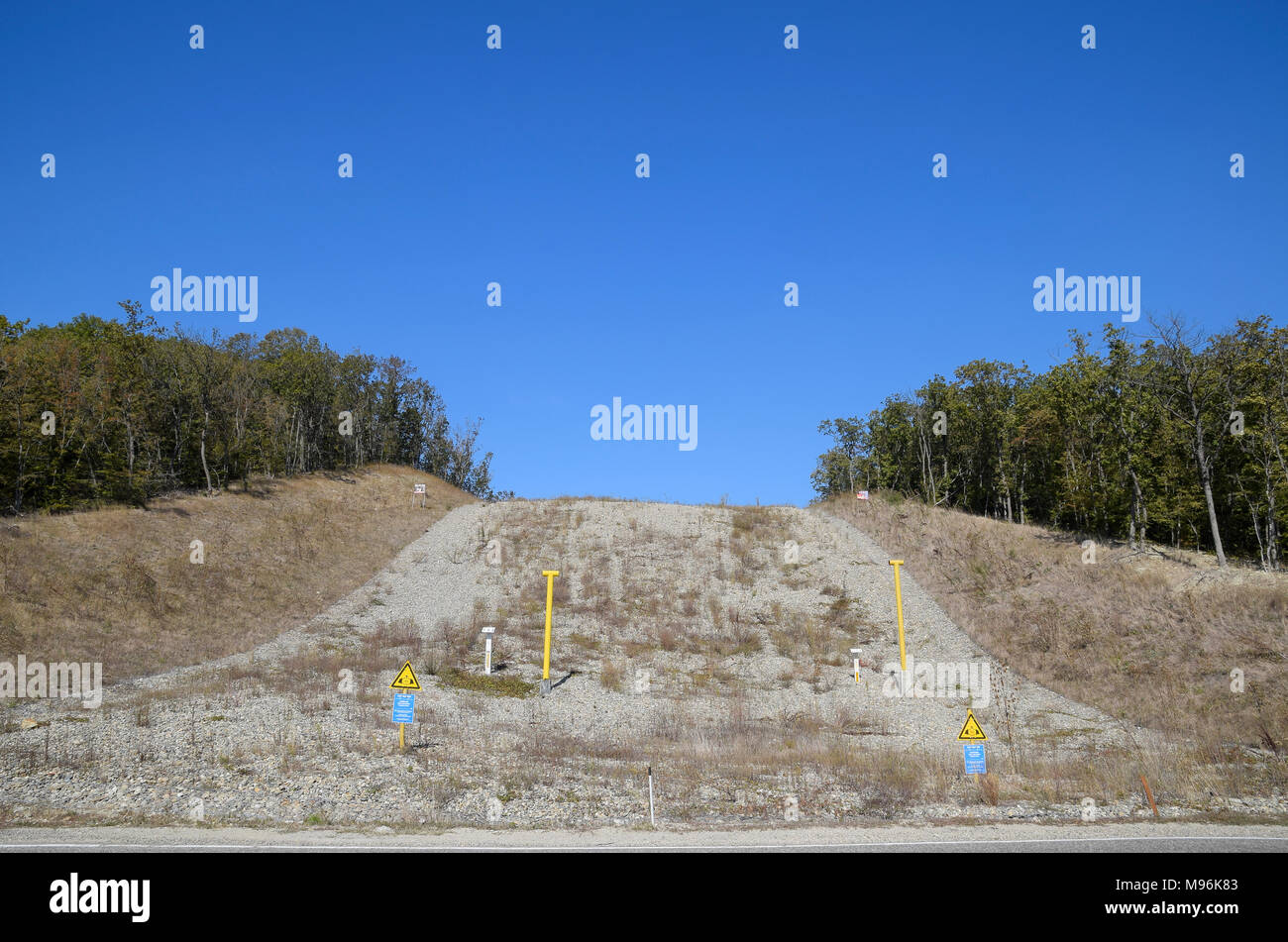 A clearing in the forest for the gas pipeline. Underground gas pipeline ...